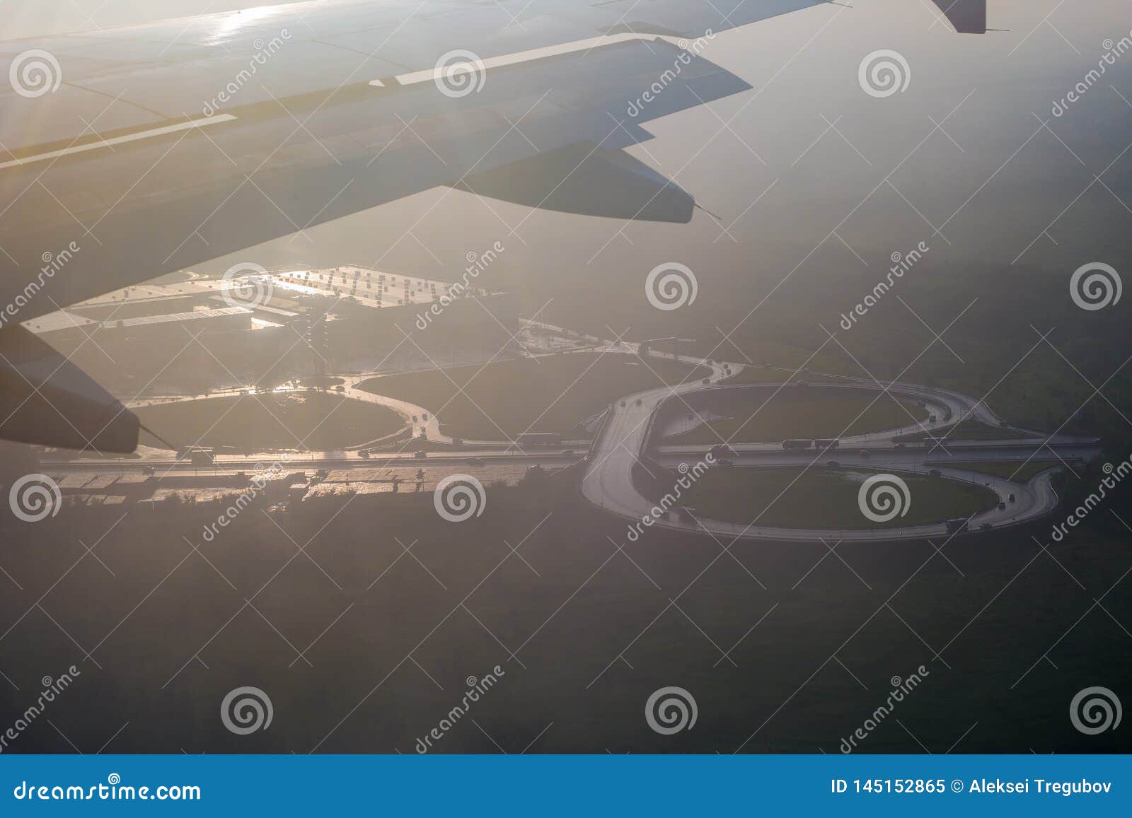Road Junction Under the Wing of the Aircraft in the Last Rays Stock ...