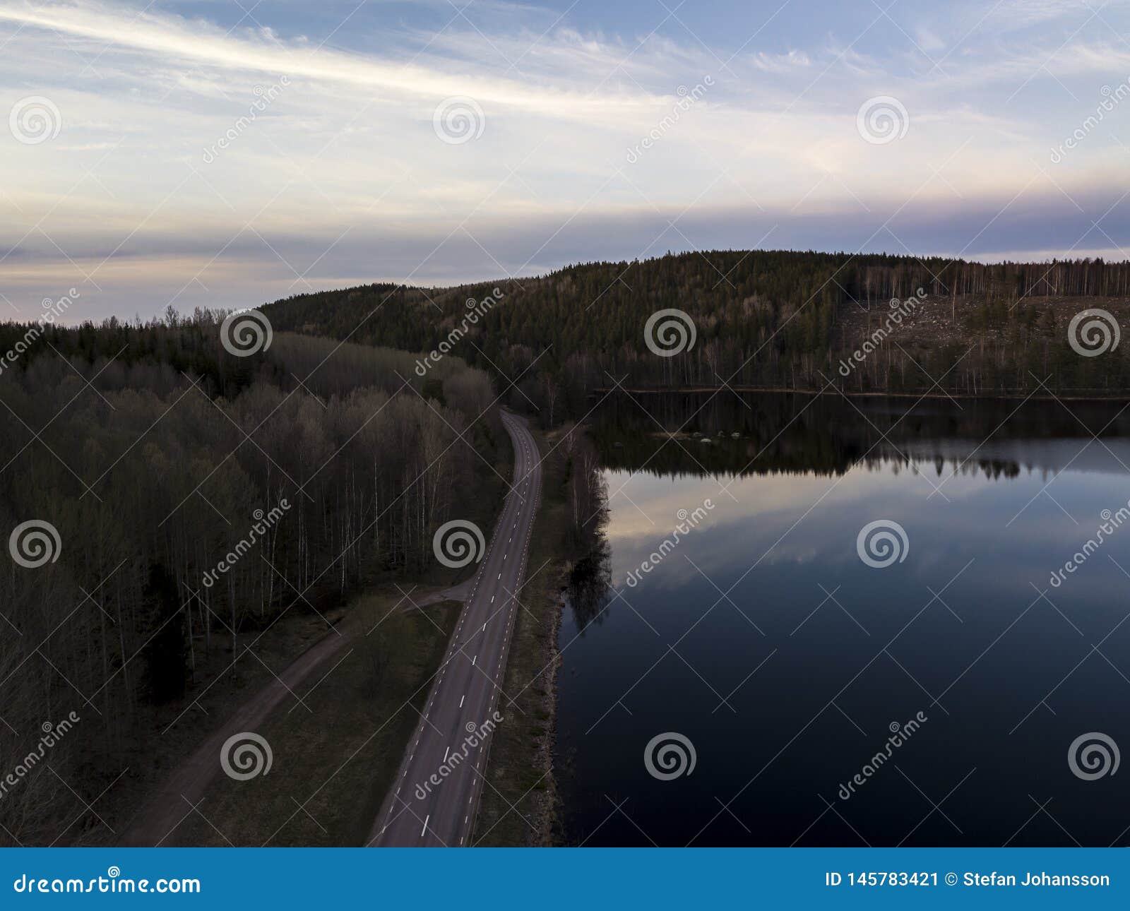 Road by lake stock image. Image of transportation, scenery - 145783421