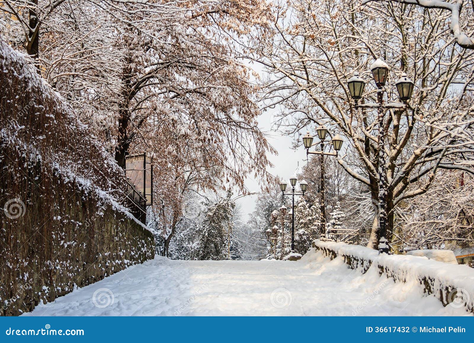 Road with lanterns in snow stock photo. Image of road - 36617432