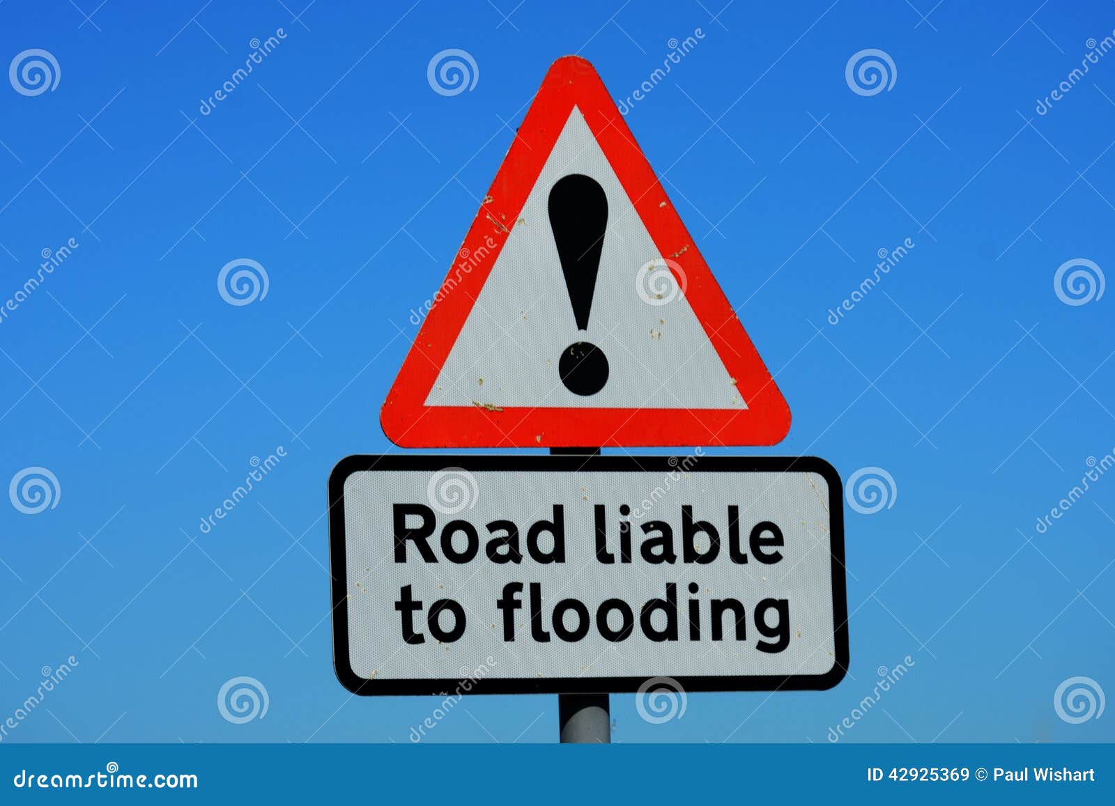 Road Liable To Flooding Sign Stock Image - Image of climate, road: 42925369