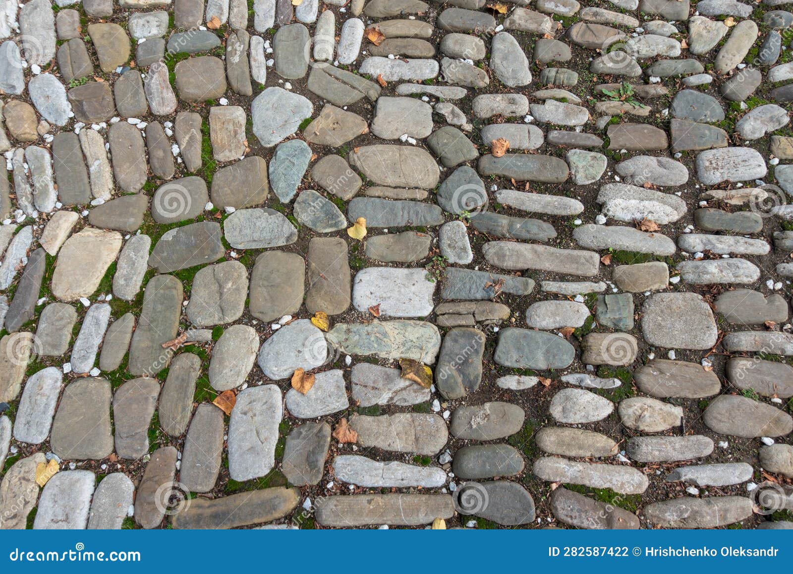 The Road is Made of Smooth Stones. Cobblestone Texture Stock Photo ...