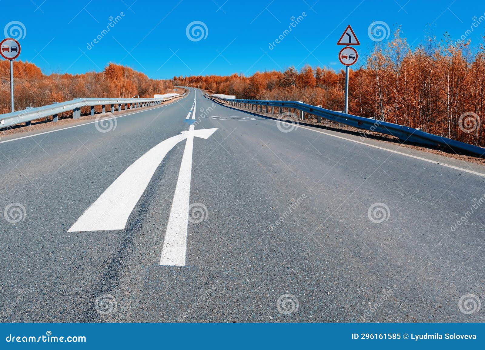 Road Markings on the Asphalt and "no Overtaking" Road Signs Stock Image ...