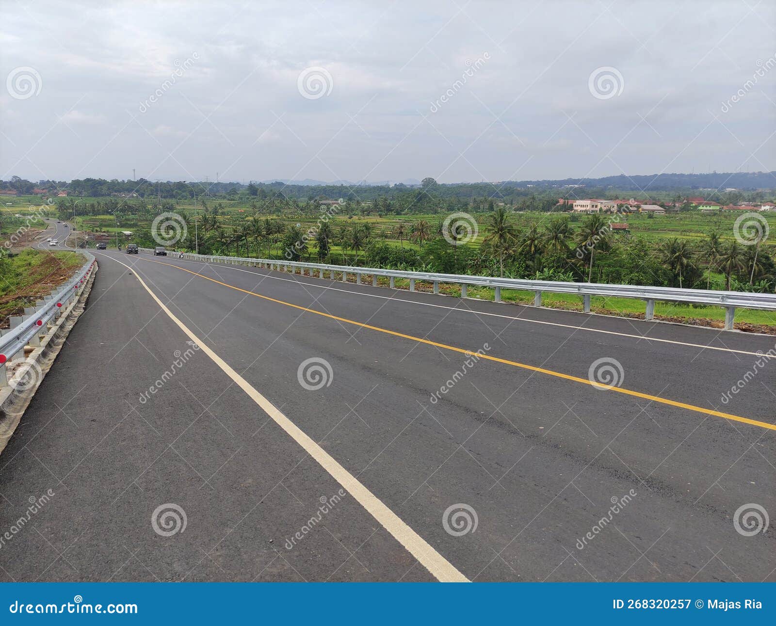 The Road that Passes through Beautiful Scenery Stock Image - Image of ...