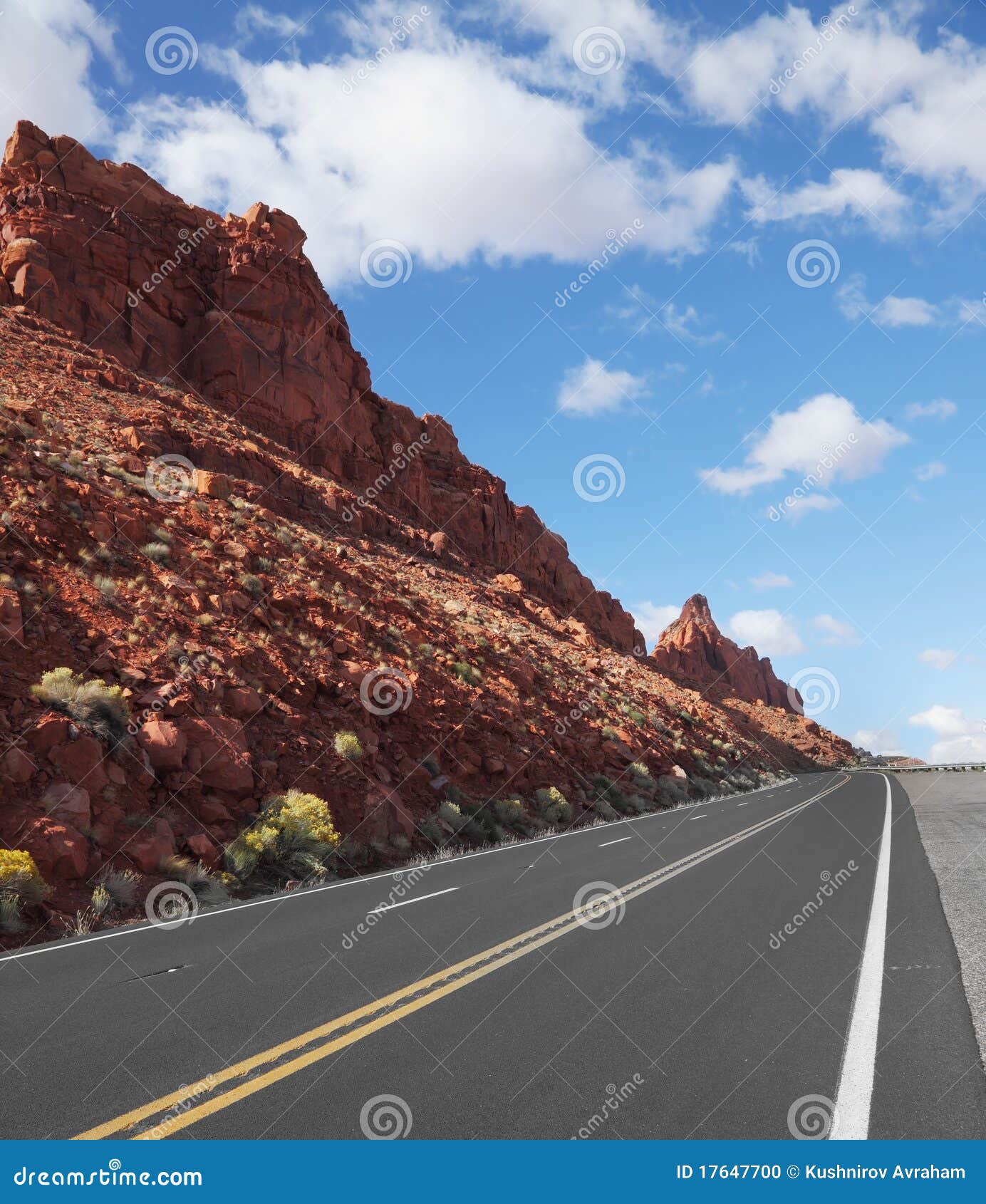 The Road Passes Rocks of Sandstone Stock Photo - Image of marking, blue ...