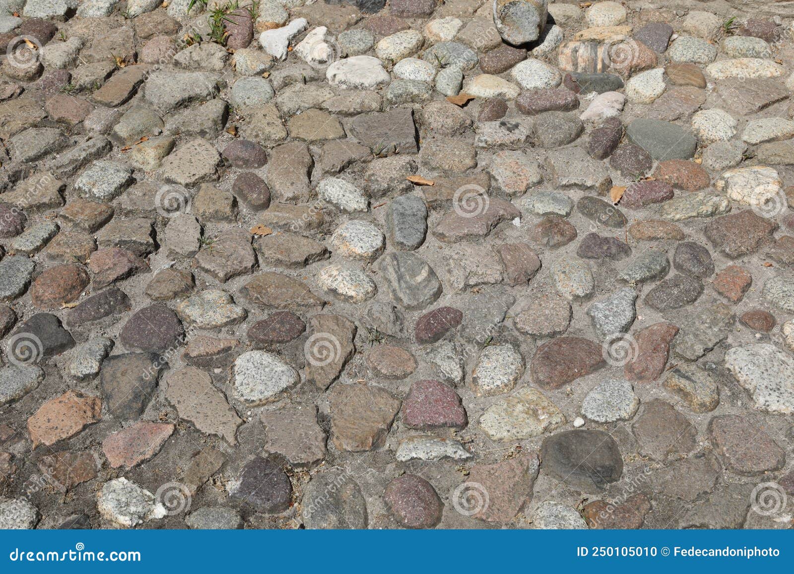 Road Pavement Made of Pebbles and Stones of Various Sizes Stock Photo ...