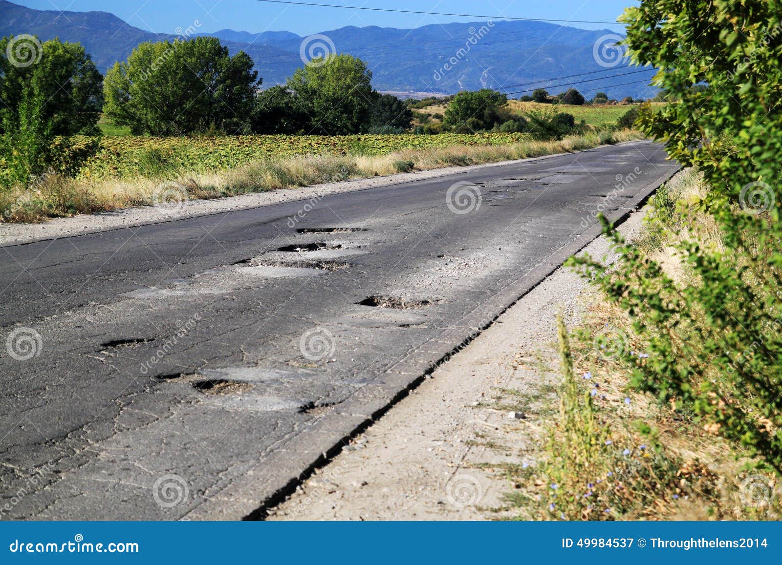 Road with Potholes stock image. Image of pavement, black - 49984537