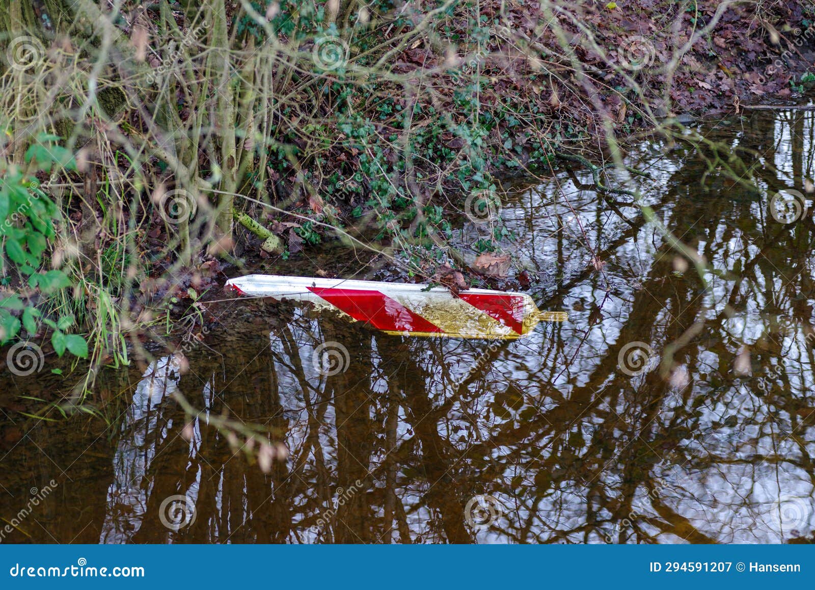 Road pylon in a ditch stock image. Image of plastic - 294591207