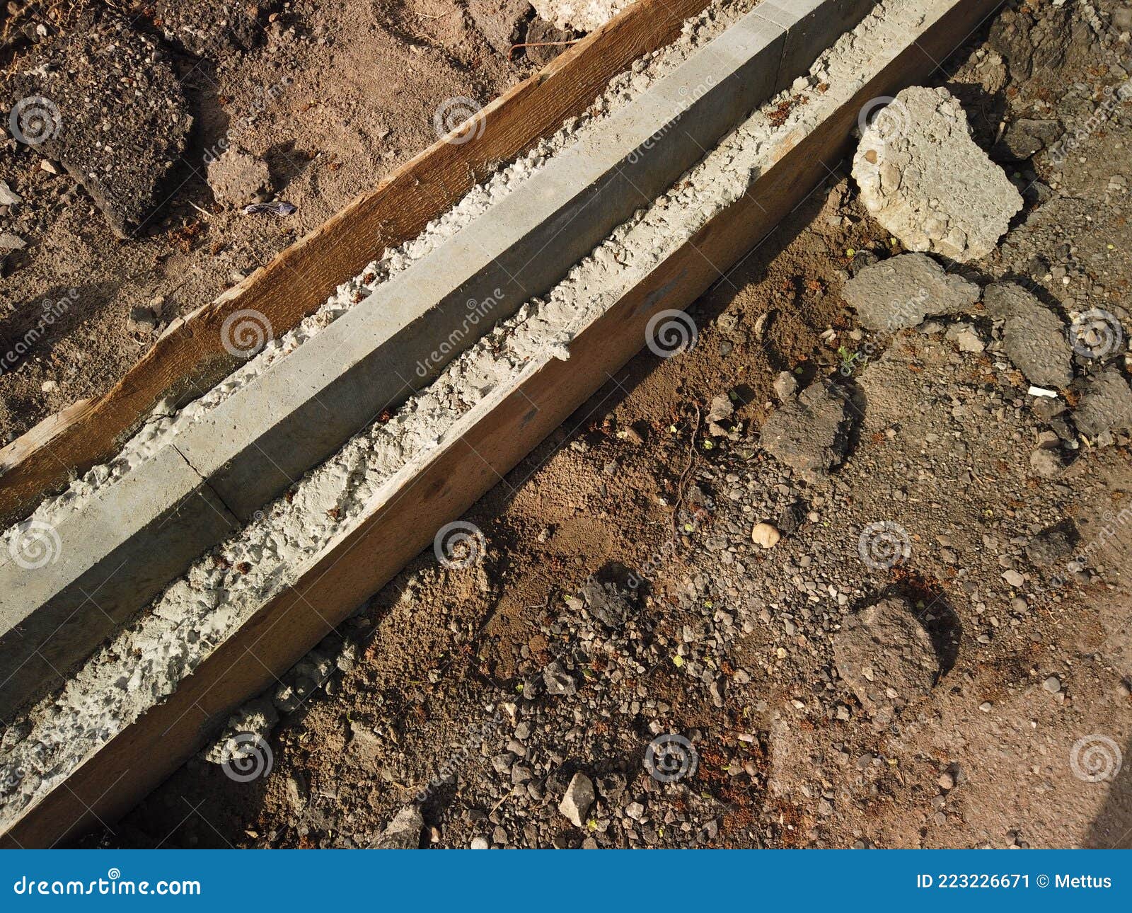 Road Reconstruction. New Curbstone Installed and Fixed with Concrete ...