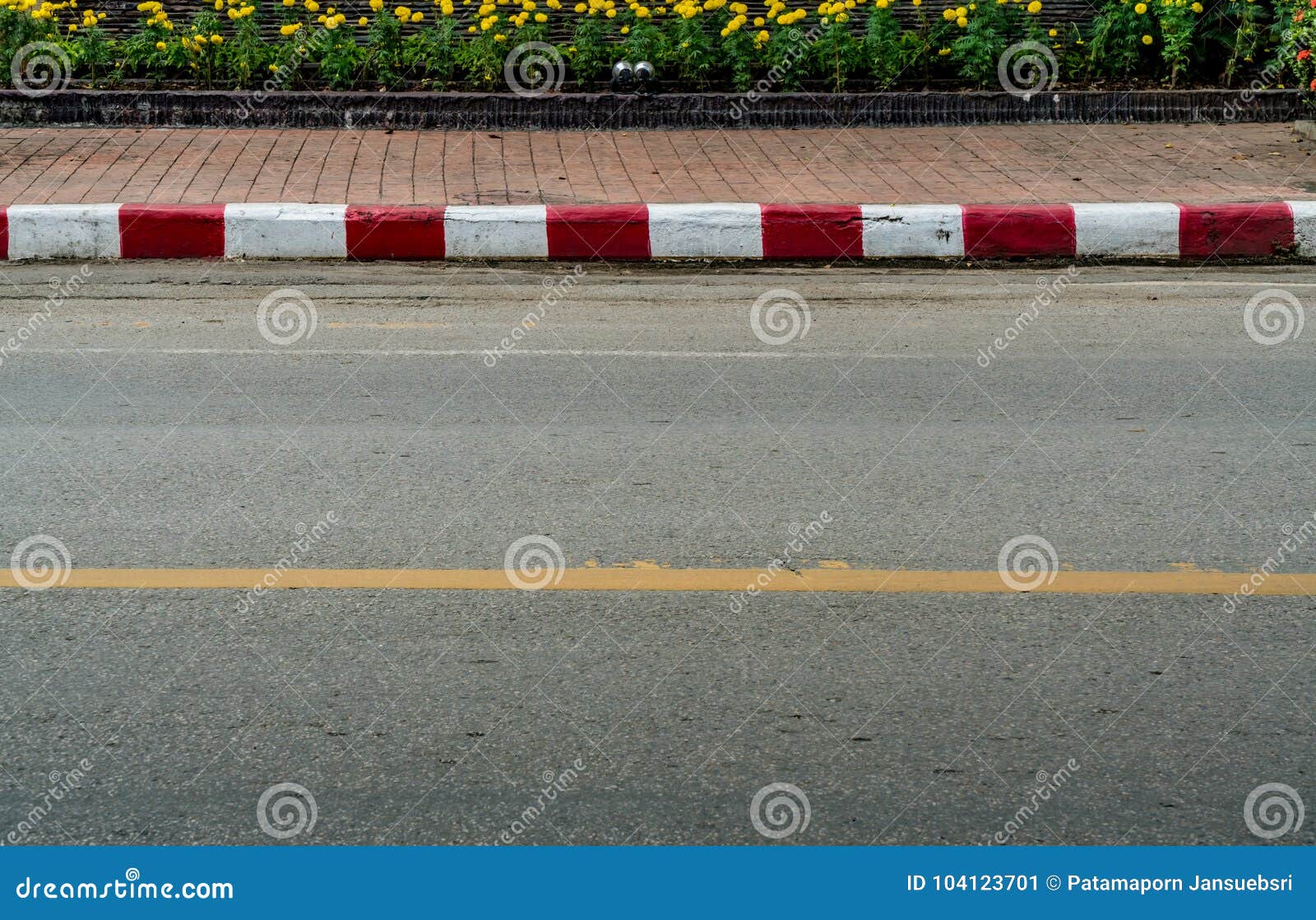 The Red And White Curb Striping Or Road Markings On The Roadside ...