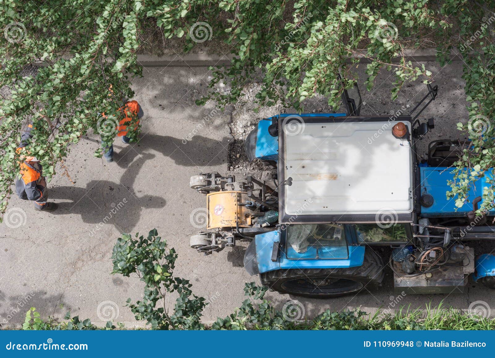 Road Repair. Asphalt Cutting Machine and Road Workers Editorial Stock ...