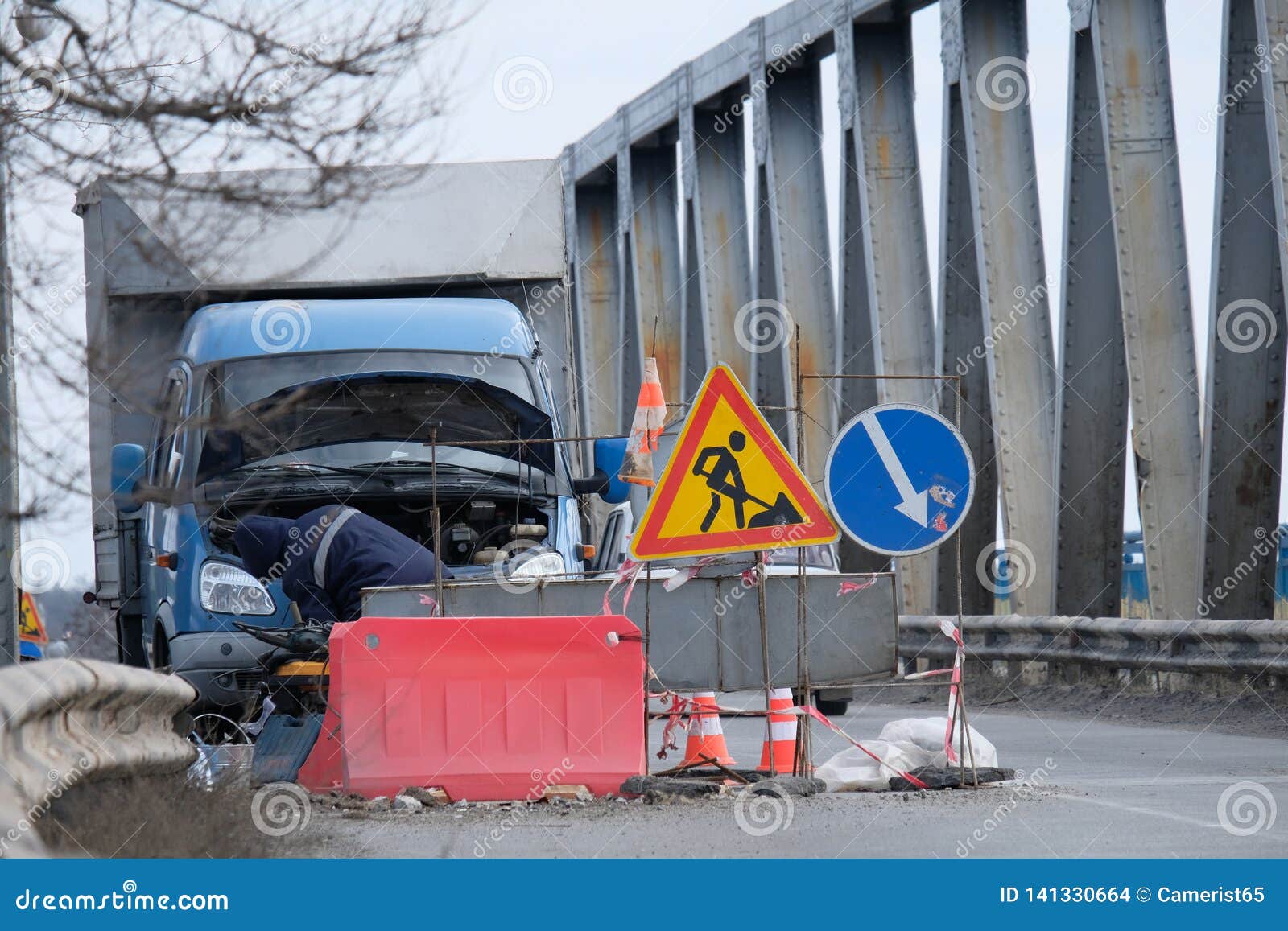 Road Repair on the Bridge in Winter Stock Photo - Image of repair ...