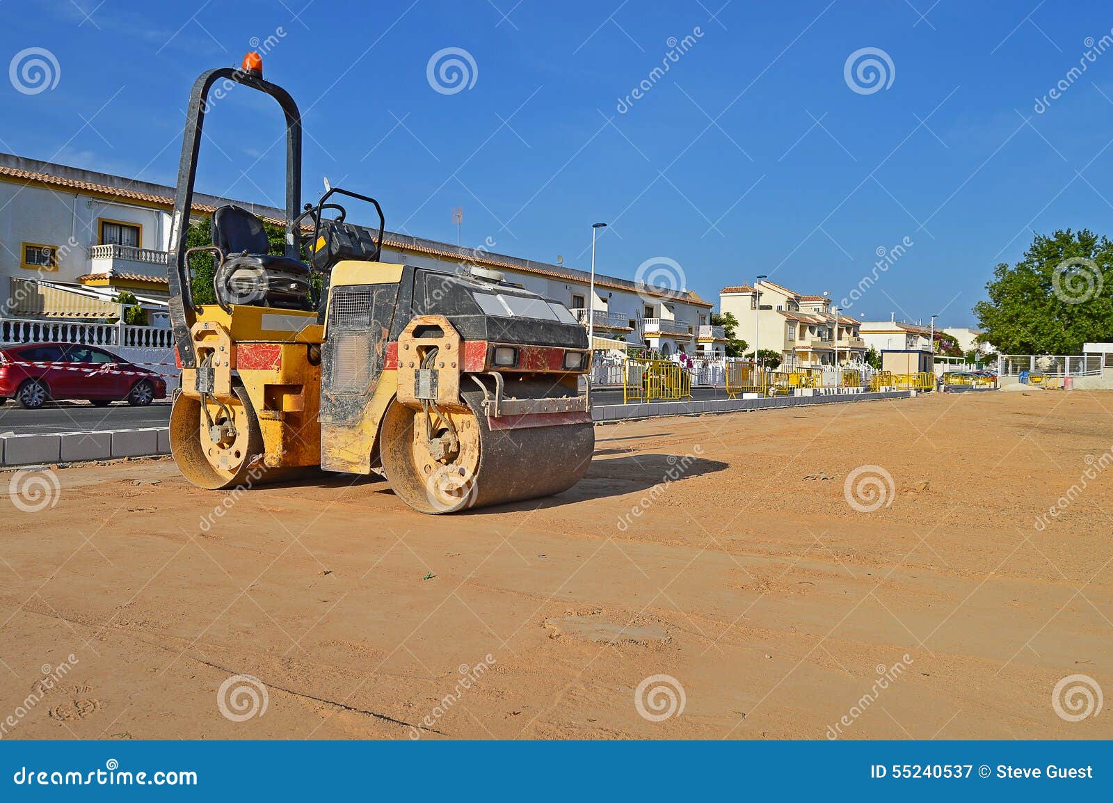 Road Roller With Spikes And Truck Plate Compactor Are Working At ...