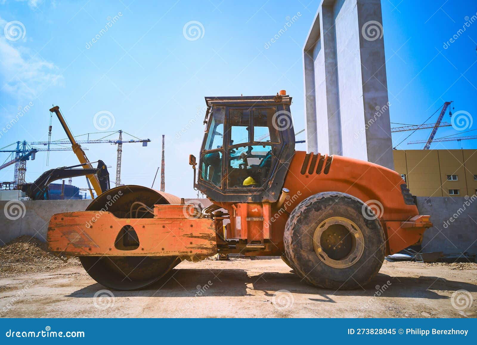 Compactor At Road Compaction Works. A Roller Compacting Asphalt On A ...
