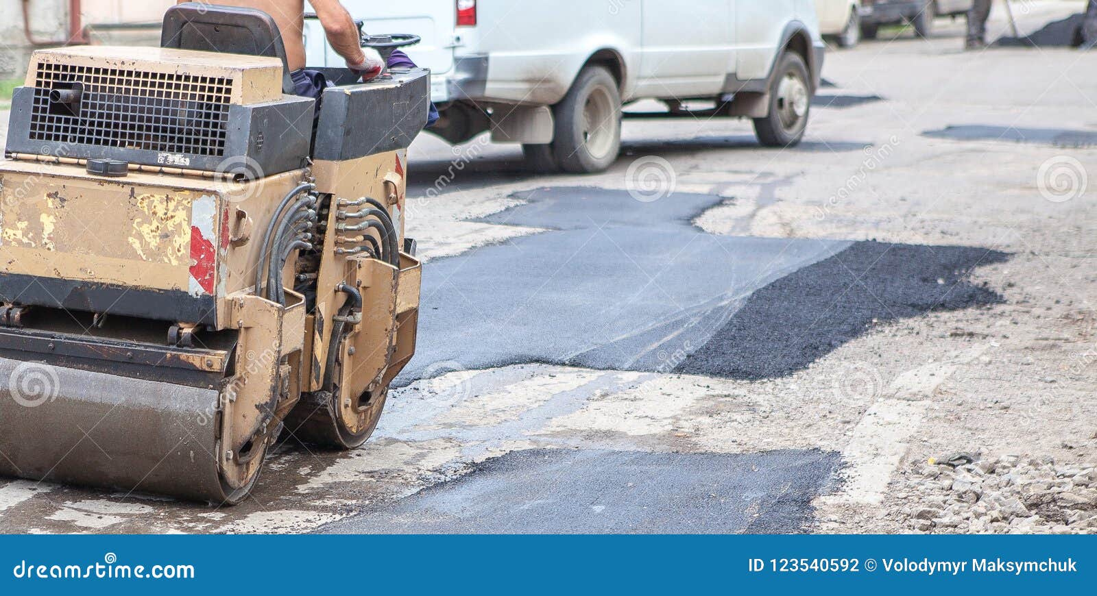 Road Roller Makes the Paving.Close View on the Road Roller Working on ...