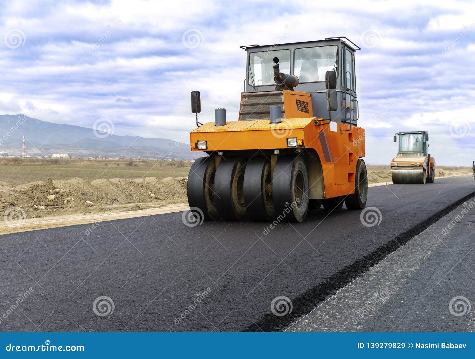 Road Roller at Road Construction Site Stock Image - Image of pave ...