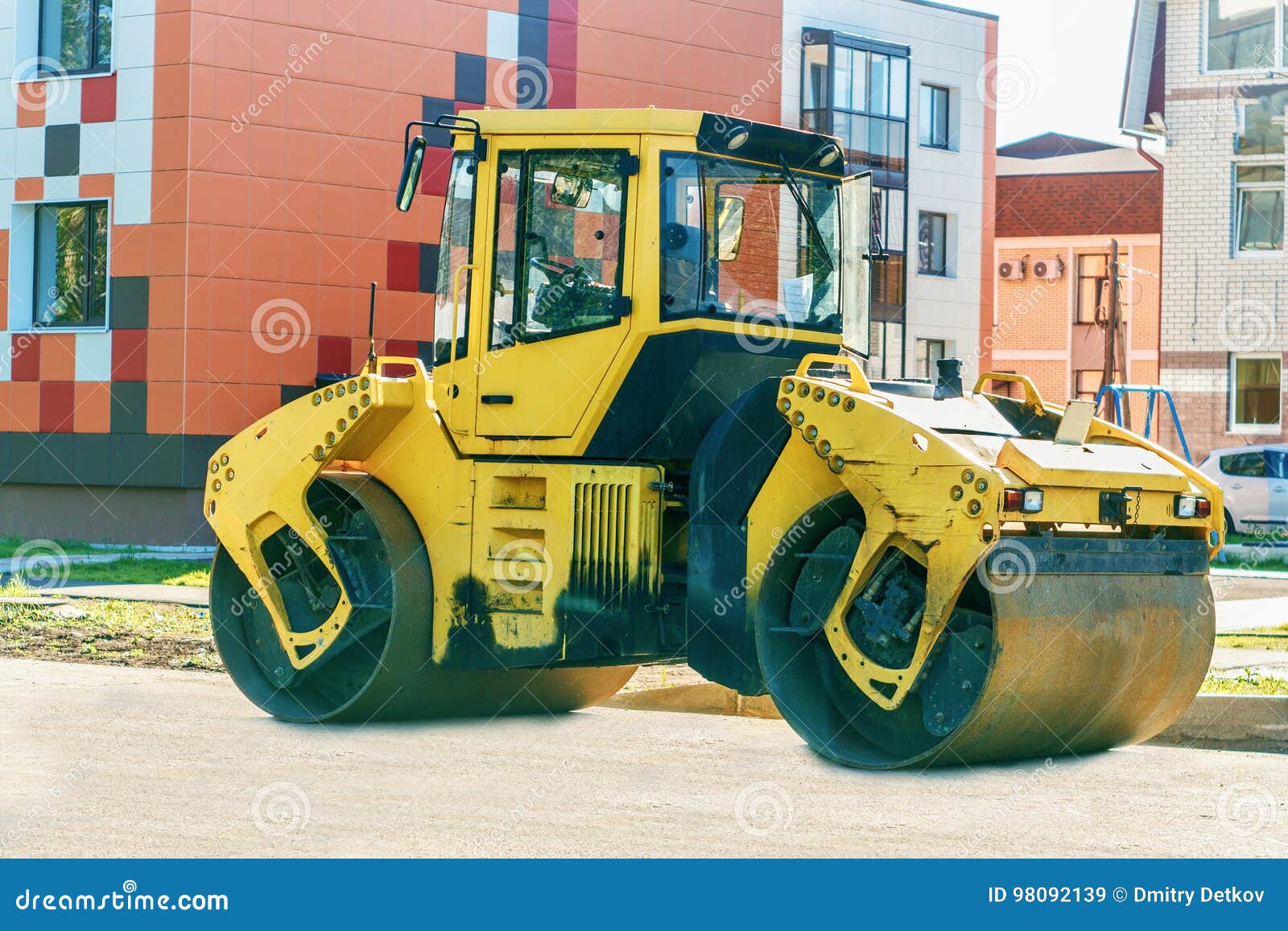 Road Roller Working at Road Construction Site in the City Stock Image ...
