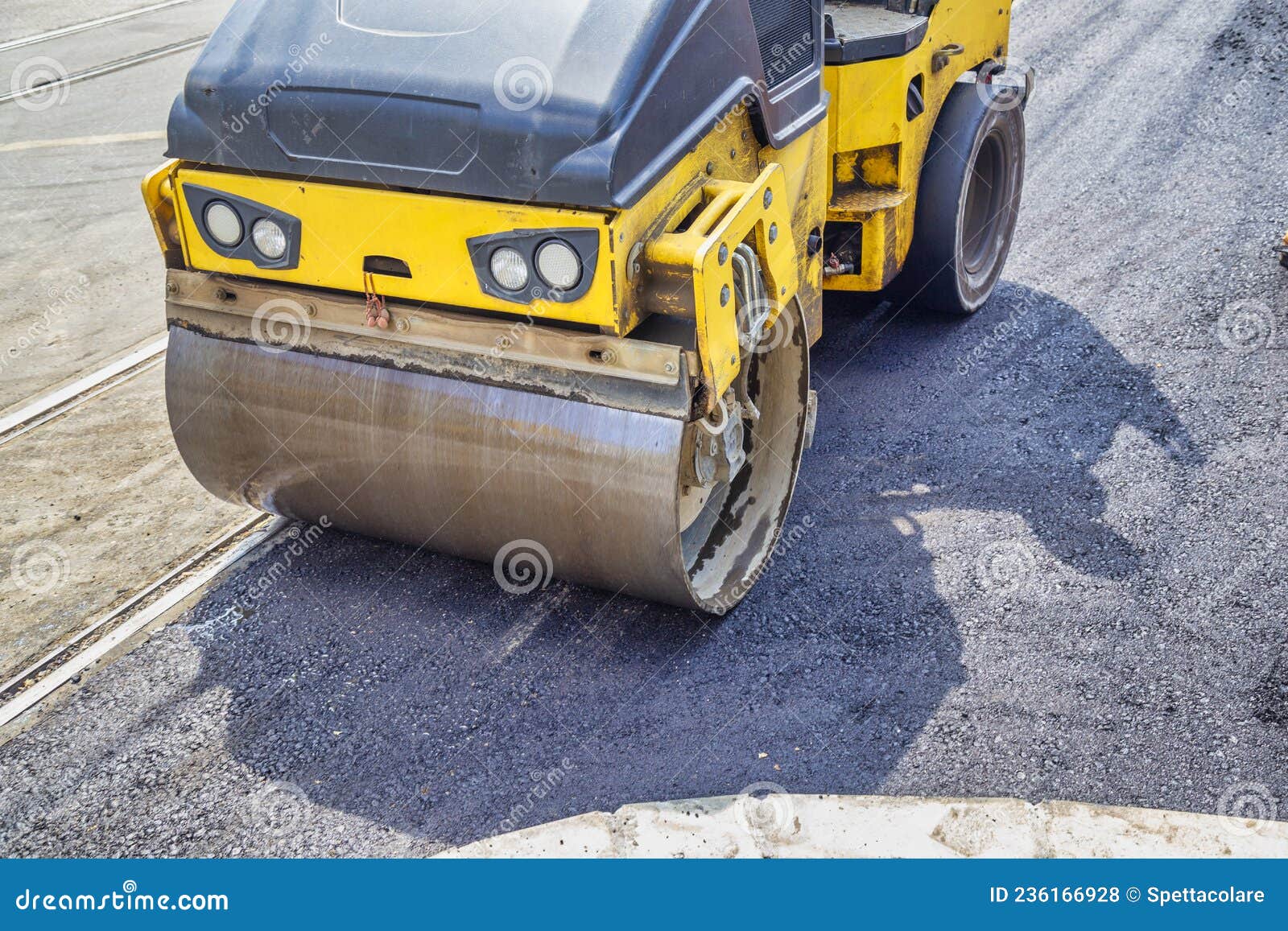 Road Roller Working Near the Curb Stock Photo - Image of construction ...