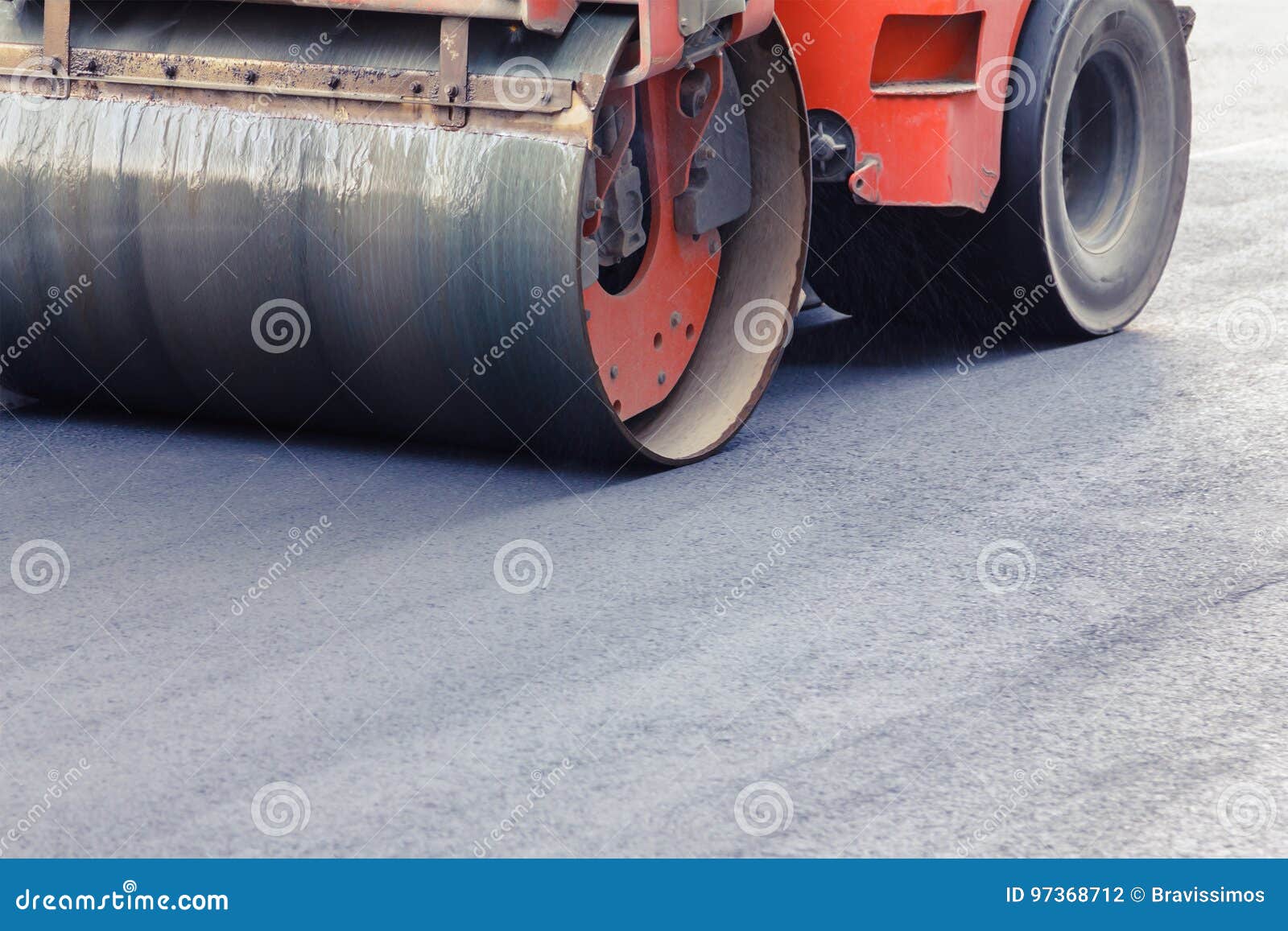 Road Roller Working on the New Road Construction Site Stock Photo ...