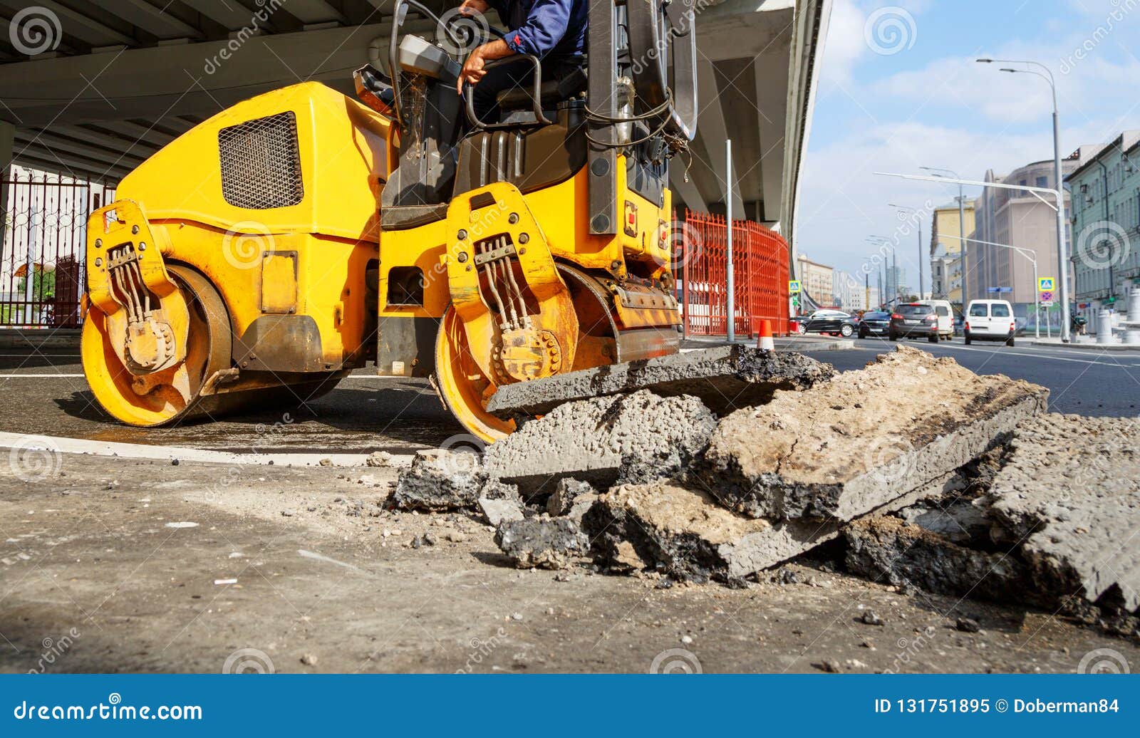 Asphalt Compactor in the City. Road Roller Working at Road Construction ...