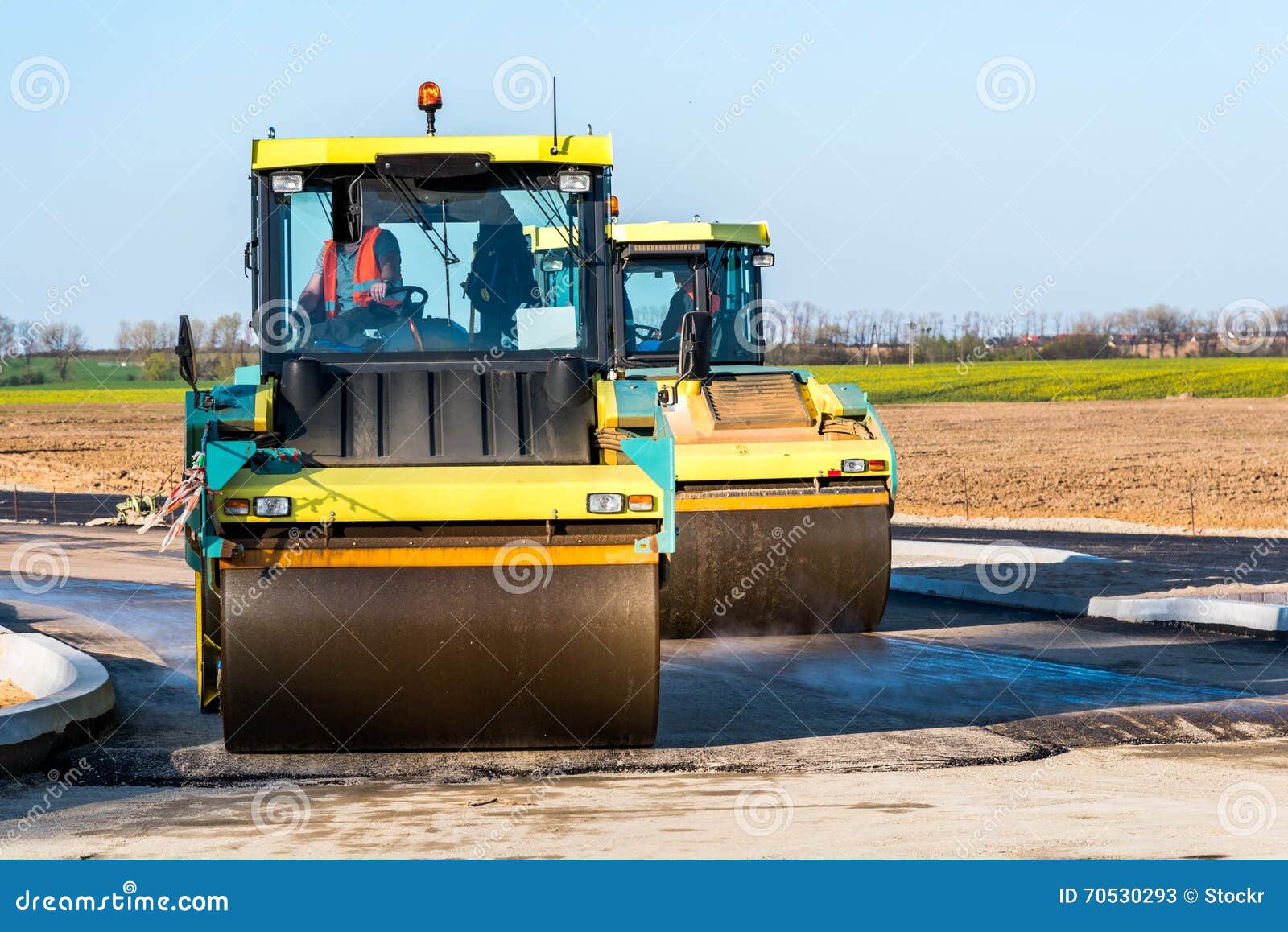 Road Rollers Working on the Construction Site Stock Image - Image of ...