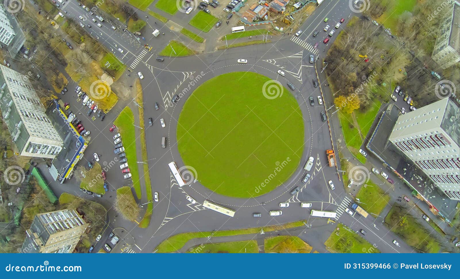 Road Roundabout on Square with Green Grass Along, Stock Photo - Image ...