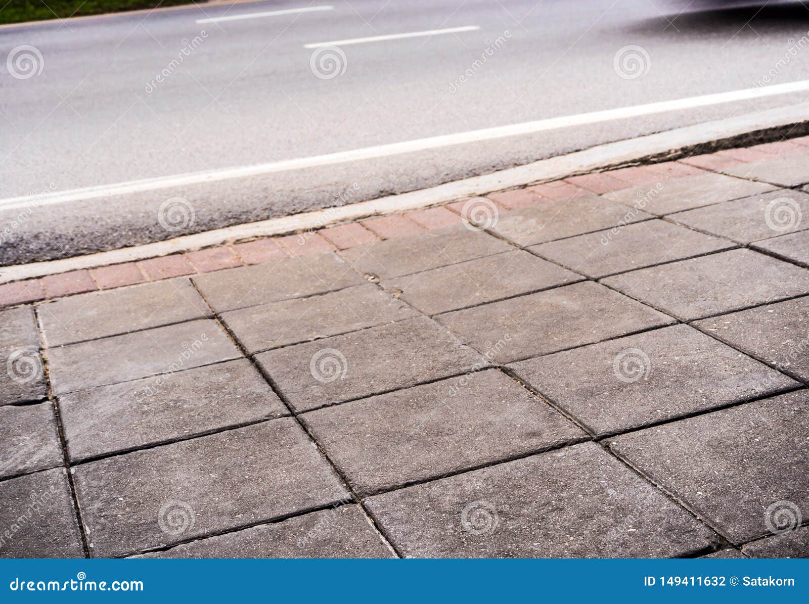 Road Side Pathway is Paved with Square Blocks of Concrete Stock Photo ...
