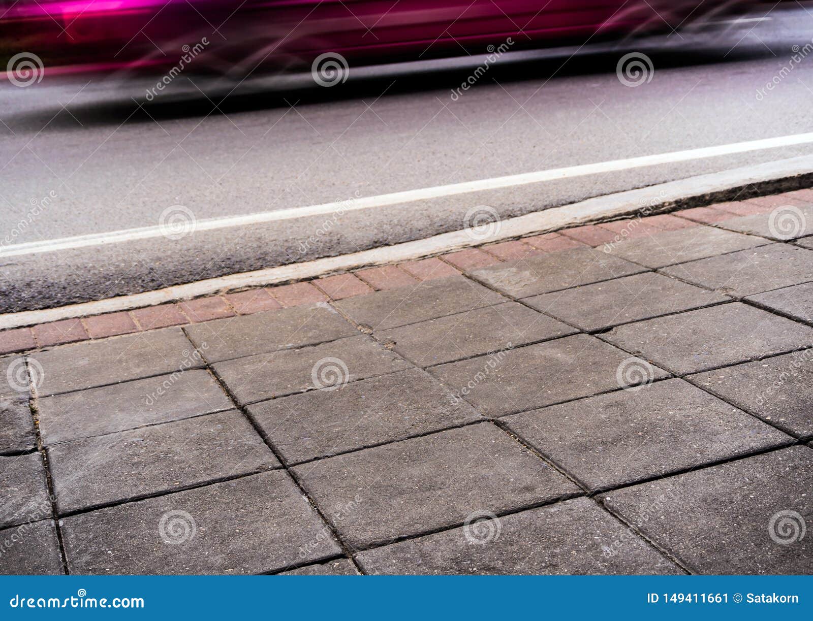 Road Side Pathway is Paved with Square Blocks of Concrete Stock Image ...