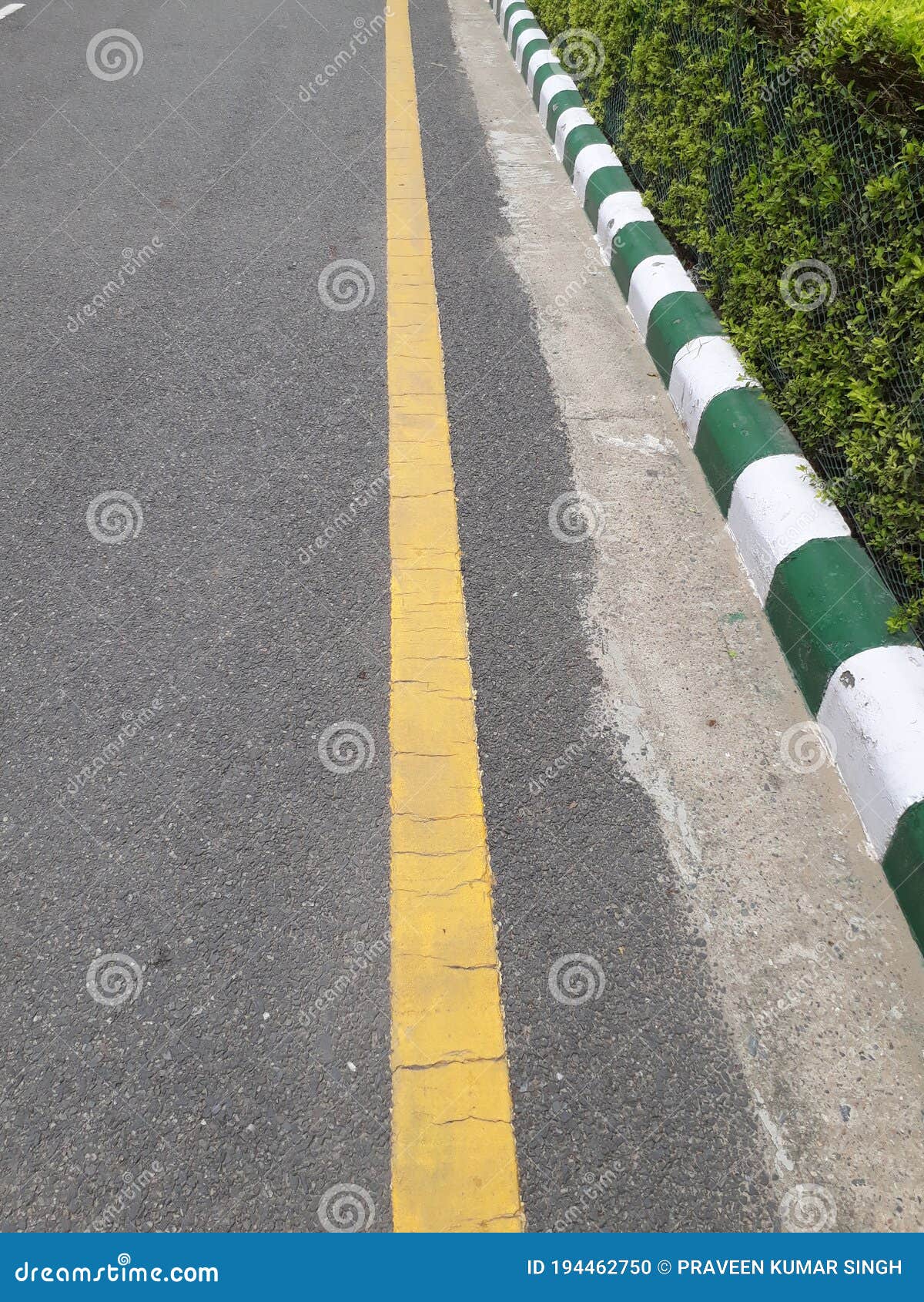 Road Side View Made Up of Fine Gray Stone and Yellow Line. Stock Photo ...