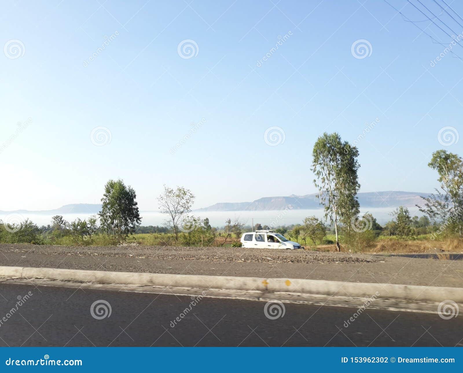 Road Side View of Trees and Hills Mountains Stock Photo - Image of ...