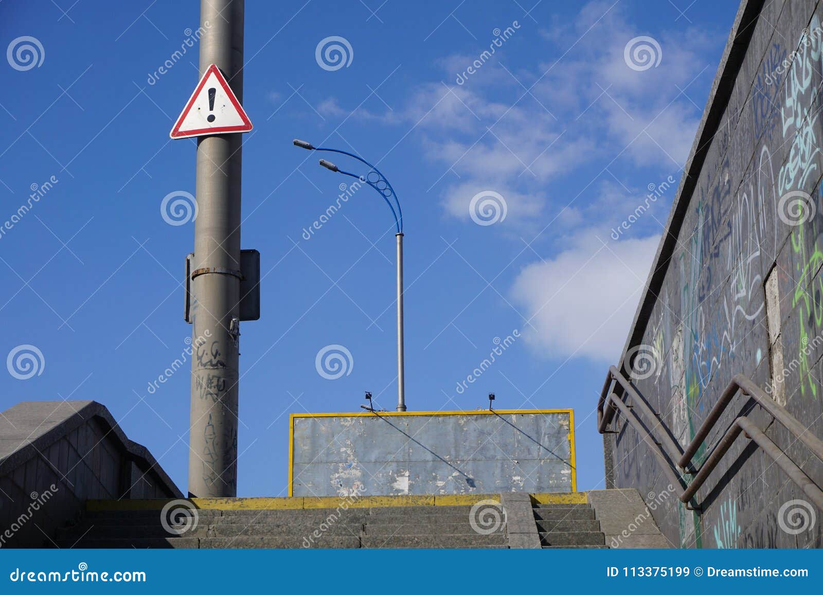 Road Sign - Black Exclamation Point in a Red Triangle Hanging on a Pole ...