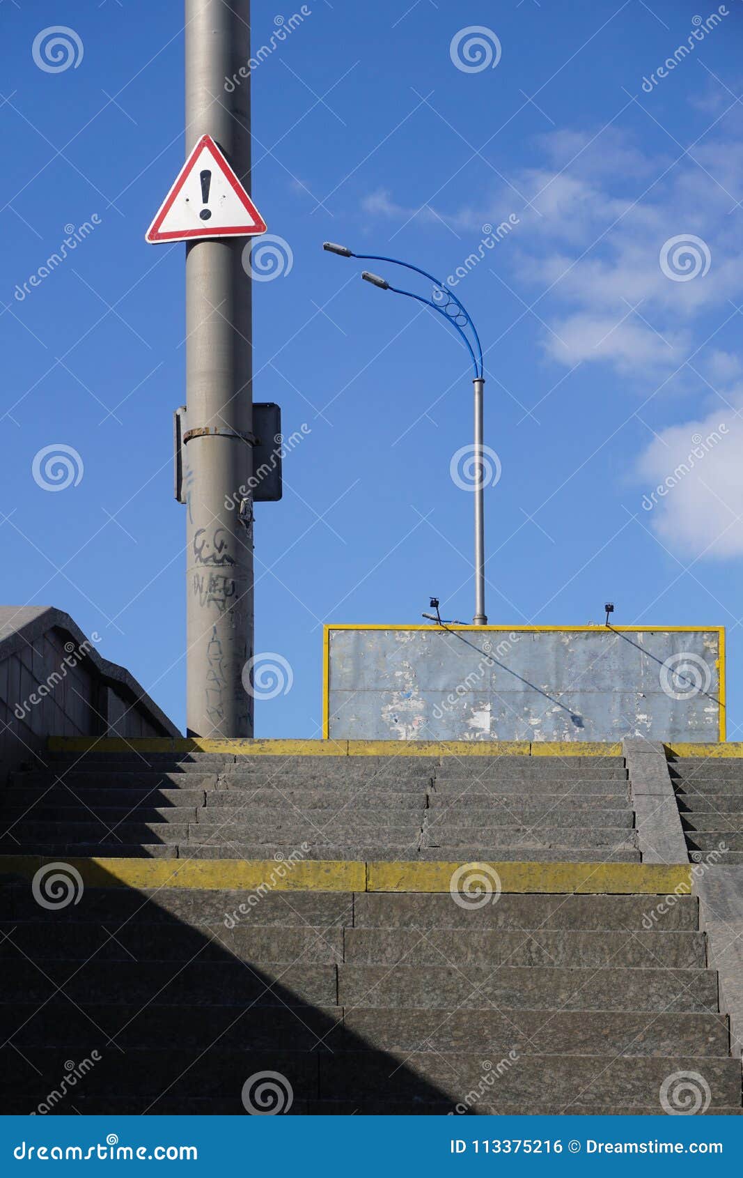 Road Sign - Black Exclamation Point in a Red Triangle Hanging on a Pole ...