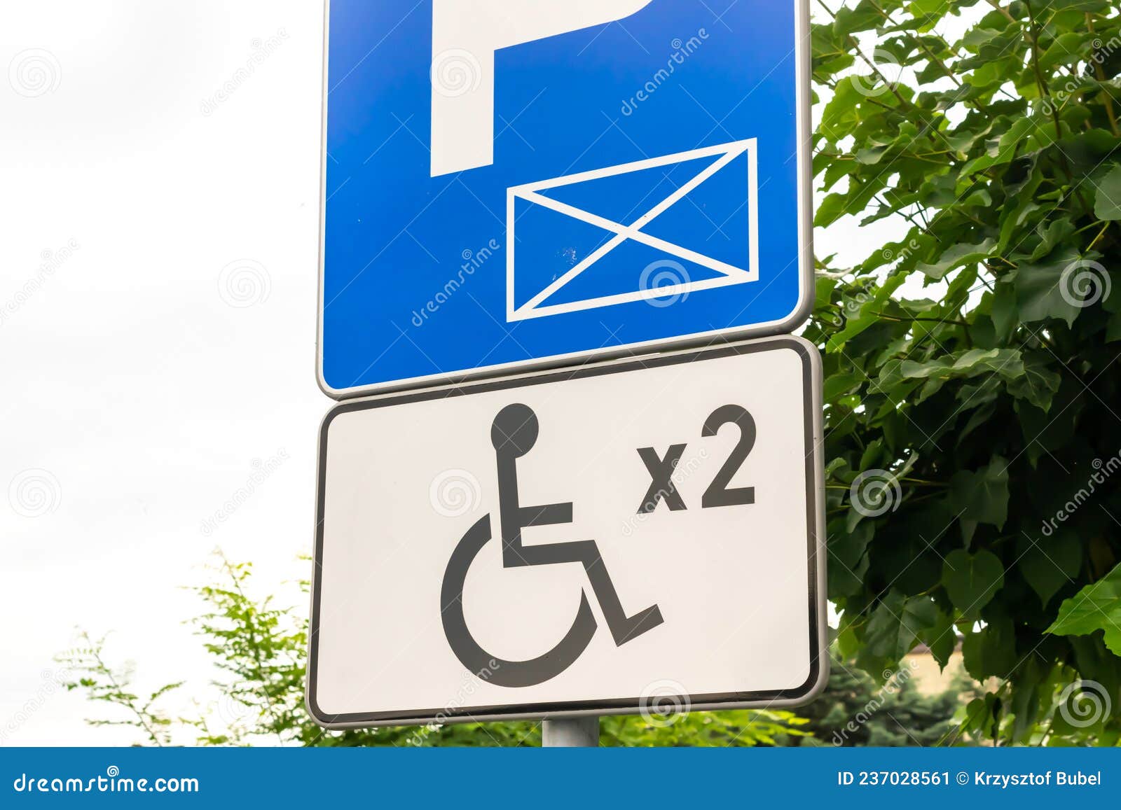 Road Sign with Disabled Parking Space Designation Stock Image - Image ...