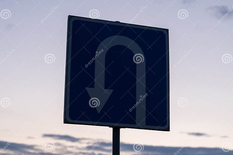 Road Sign Indicating Direction Movement in Evening Sky Stock Photo ...