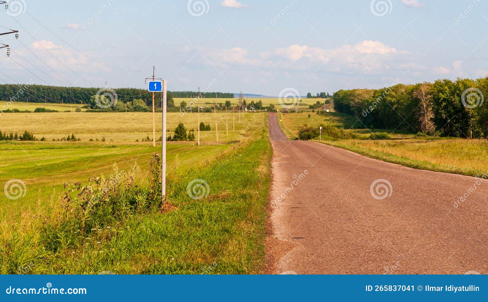Road Sign Indicating the Distance. Road among Summer Fields and Forests ...