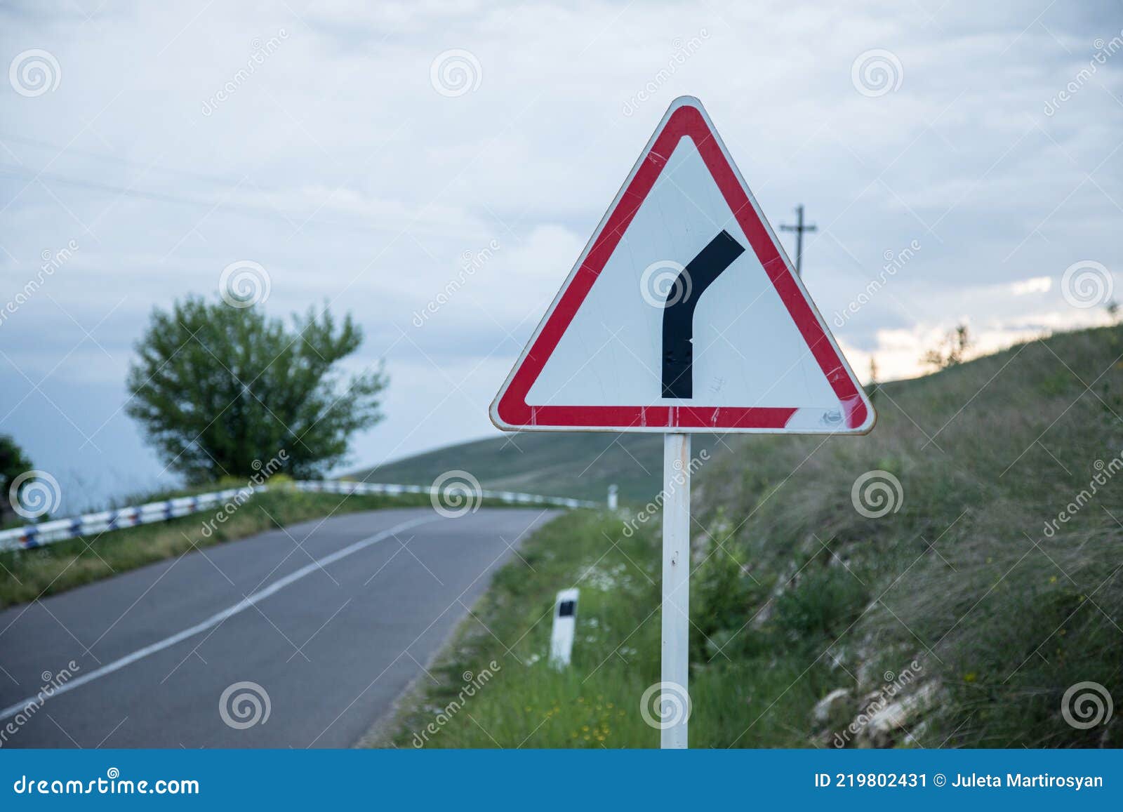 Road sign next to the road stock image. Image of percent - 219802431