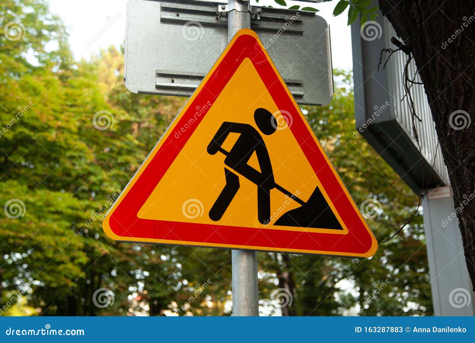 Road Sign of Reconstruction in the City Stock Image - Image of sign ...