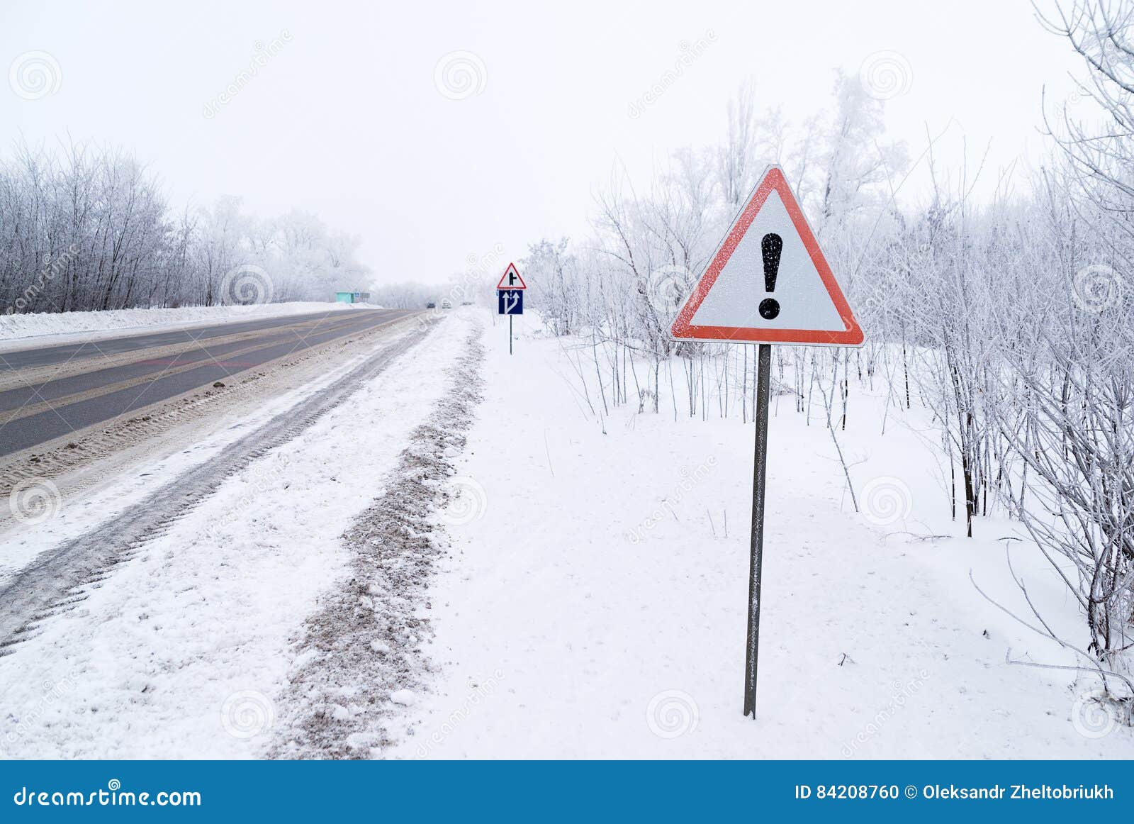 A Road Sign Stands on the Snowy Roadside Stock Photo - Image of sign ...