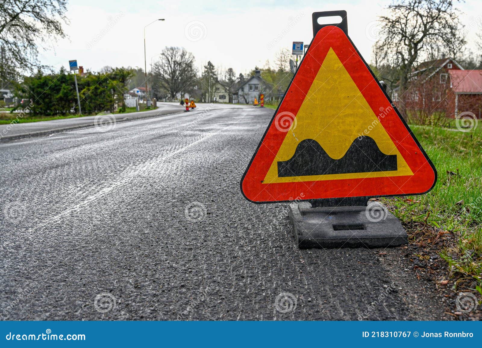Road Sign with Warning of Bumpy Road Stock Image - Image of orange ...