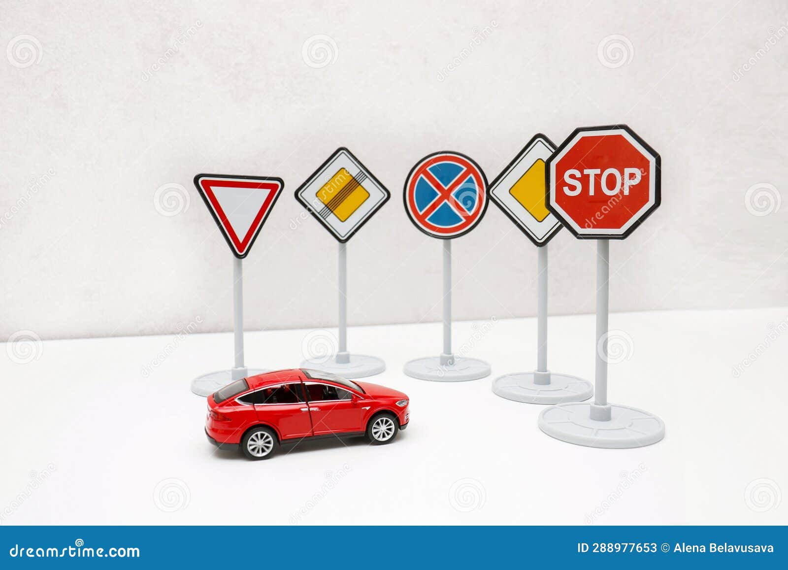Road Signs Block the Path of a Red Toy Car Stock Image - Image of test ...