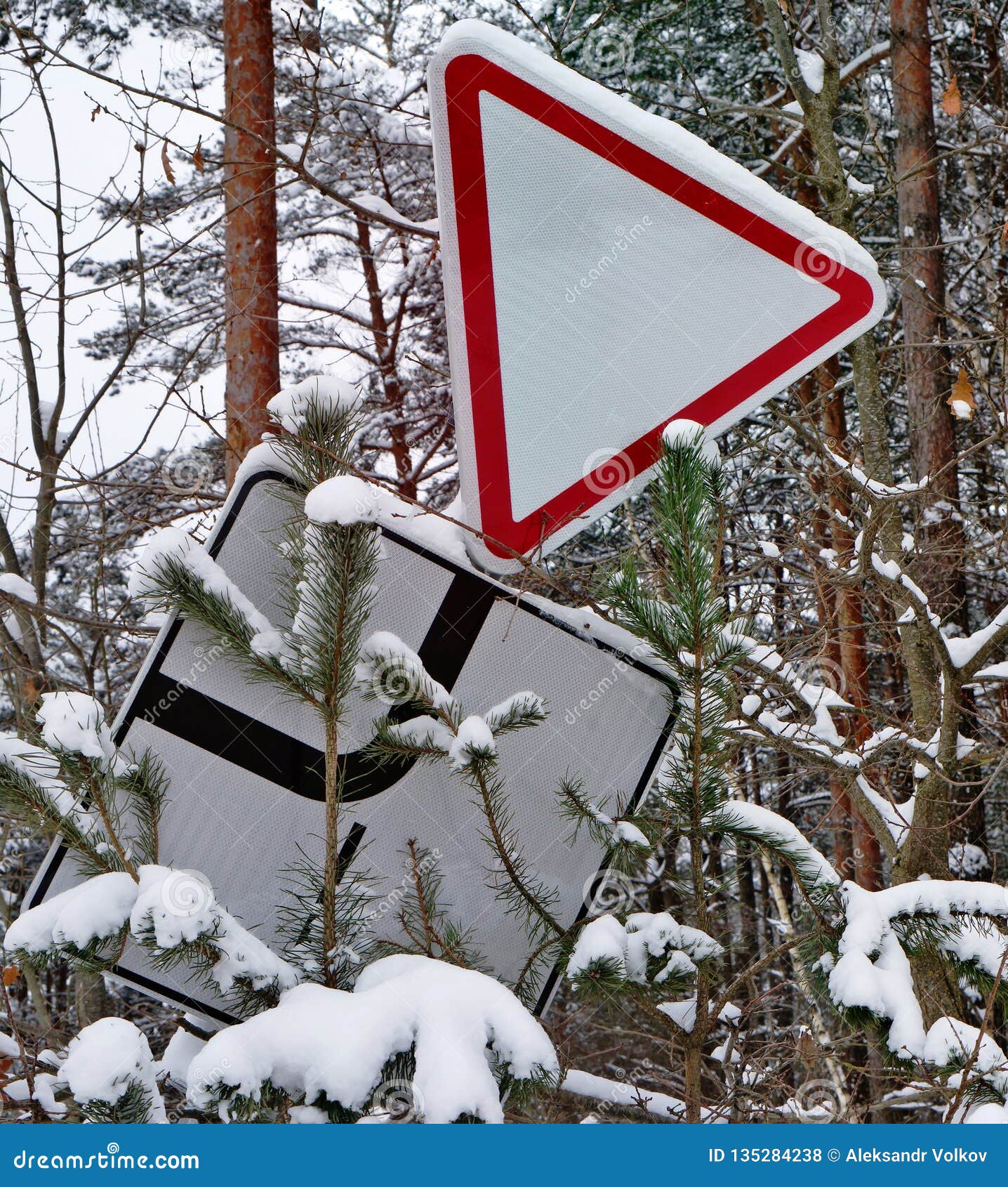 Road Signs Fall Under the Weight of Snow and Cold Stock Photo - Image ...