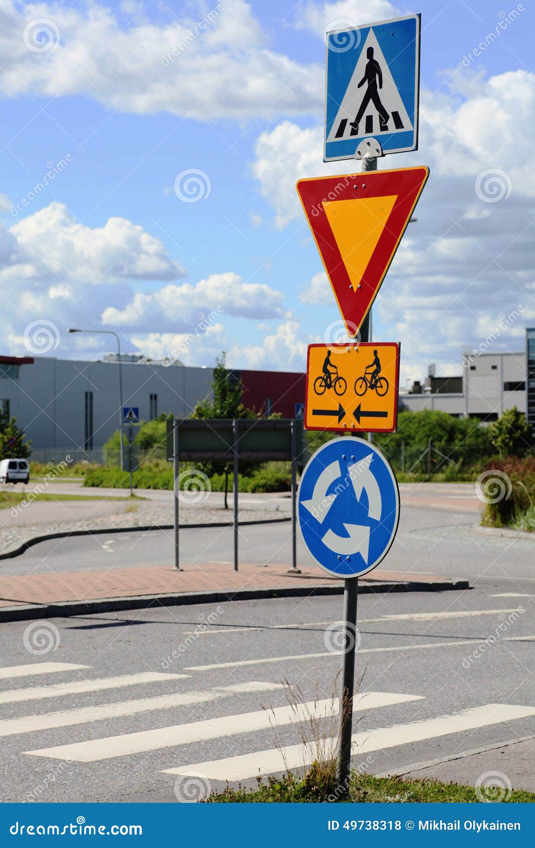 Road Signs at Intersection Roundabout Stock Photo - Image of road ...