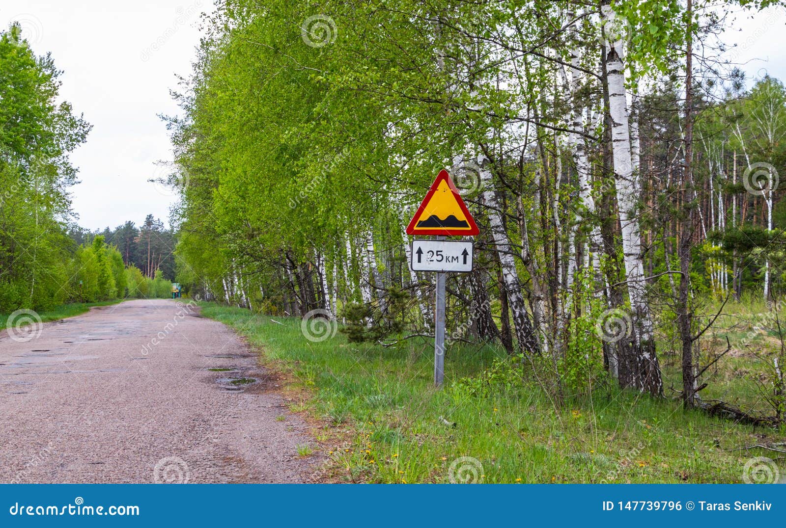 Road Signs on the Side of the Road, Caution for Drivers Stock Photo ...