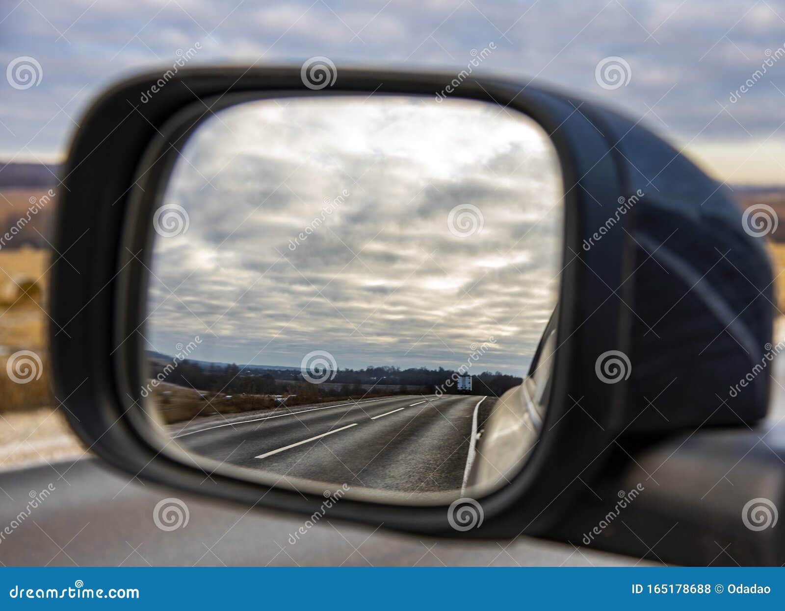 The Road and the Sky are Reflected in the Mirror of the Car Stock Photo ...