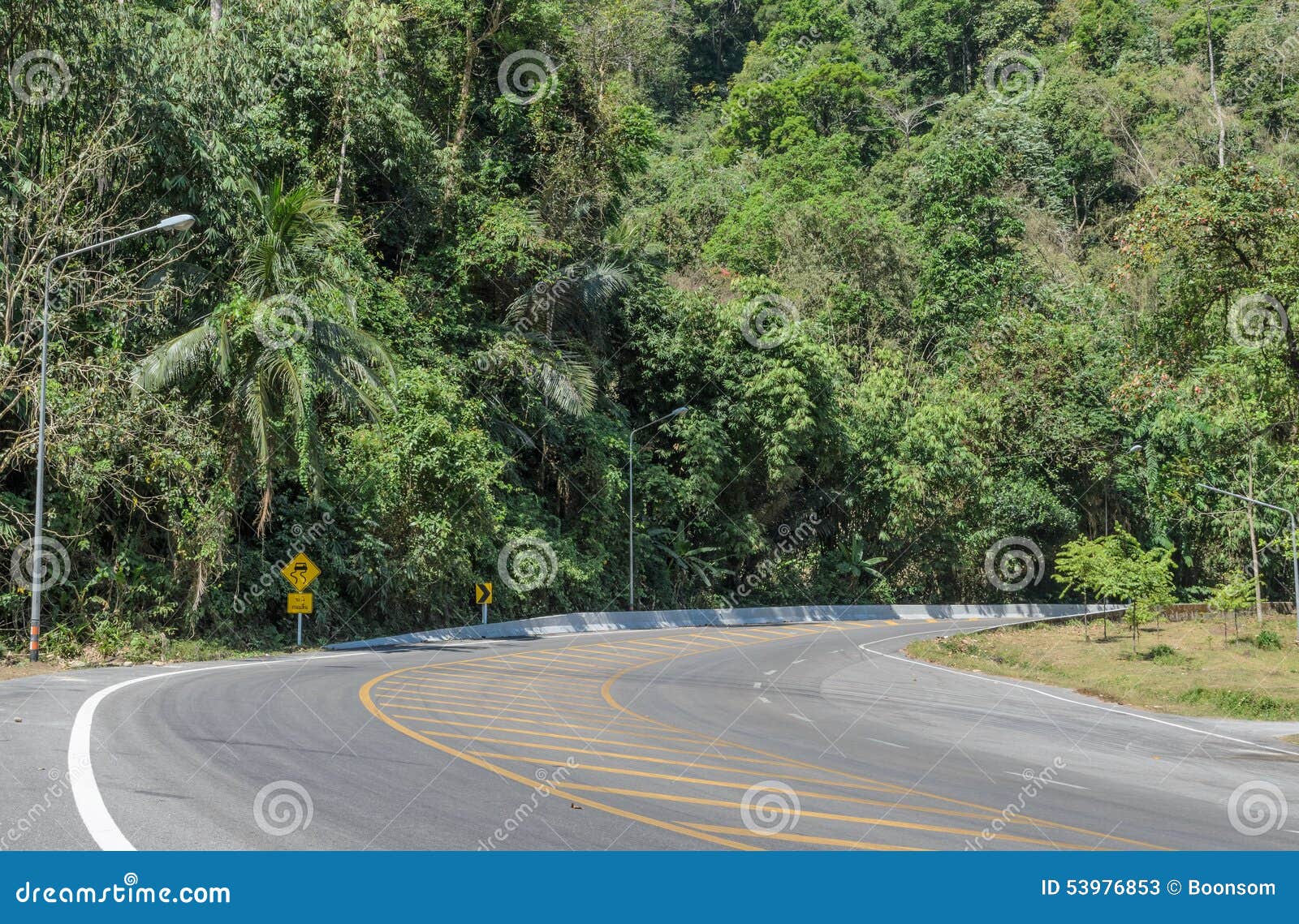 Road with Slippery Pavement Warning Sign Stock Image - Image of pole ...