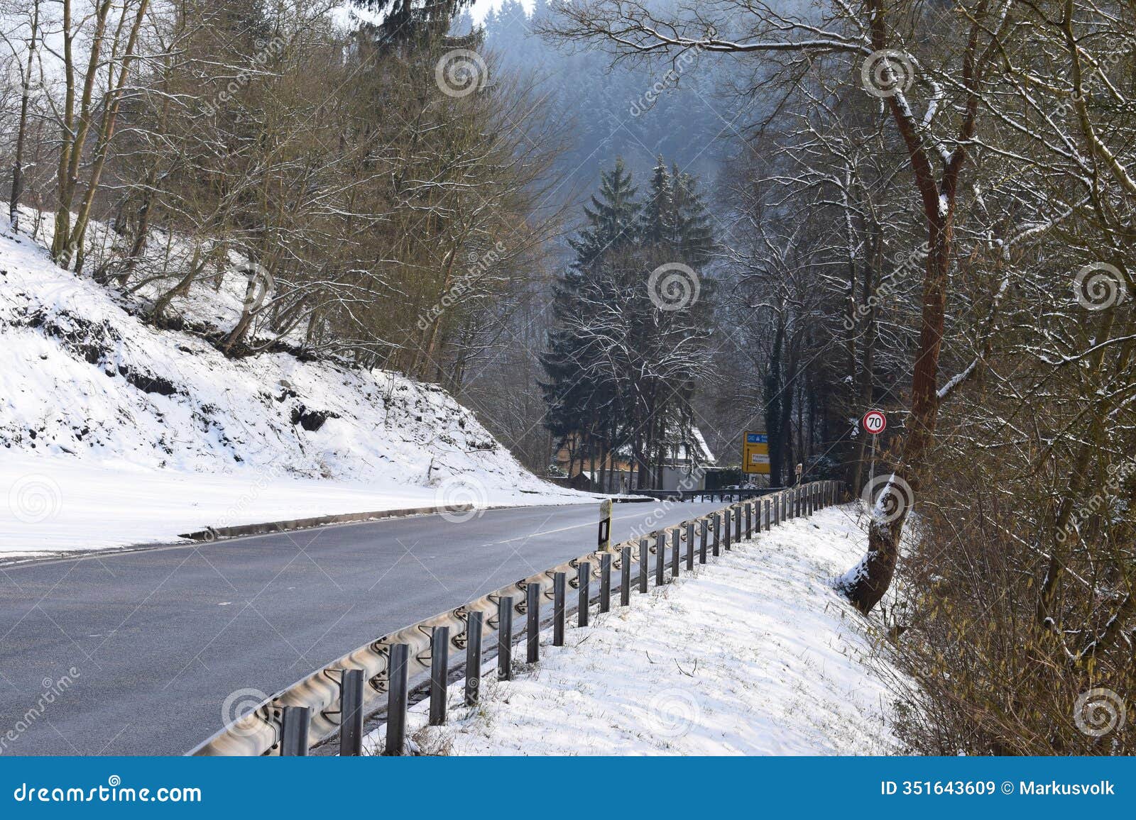 Road in the Snow Covered Winter Forest with Traffic Signs Stock Image ...