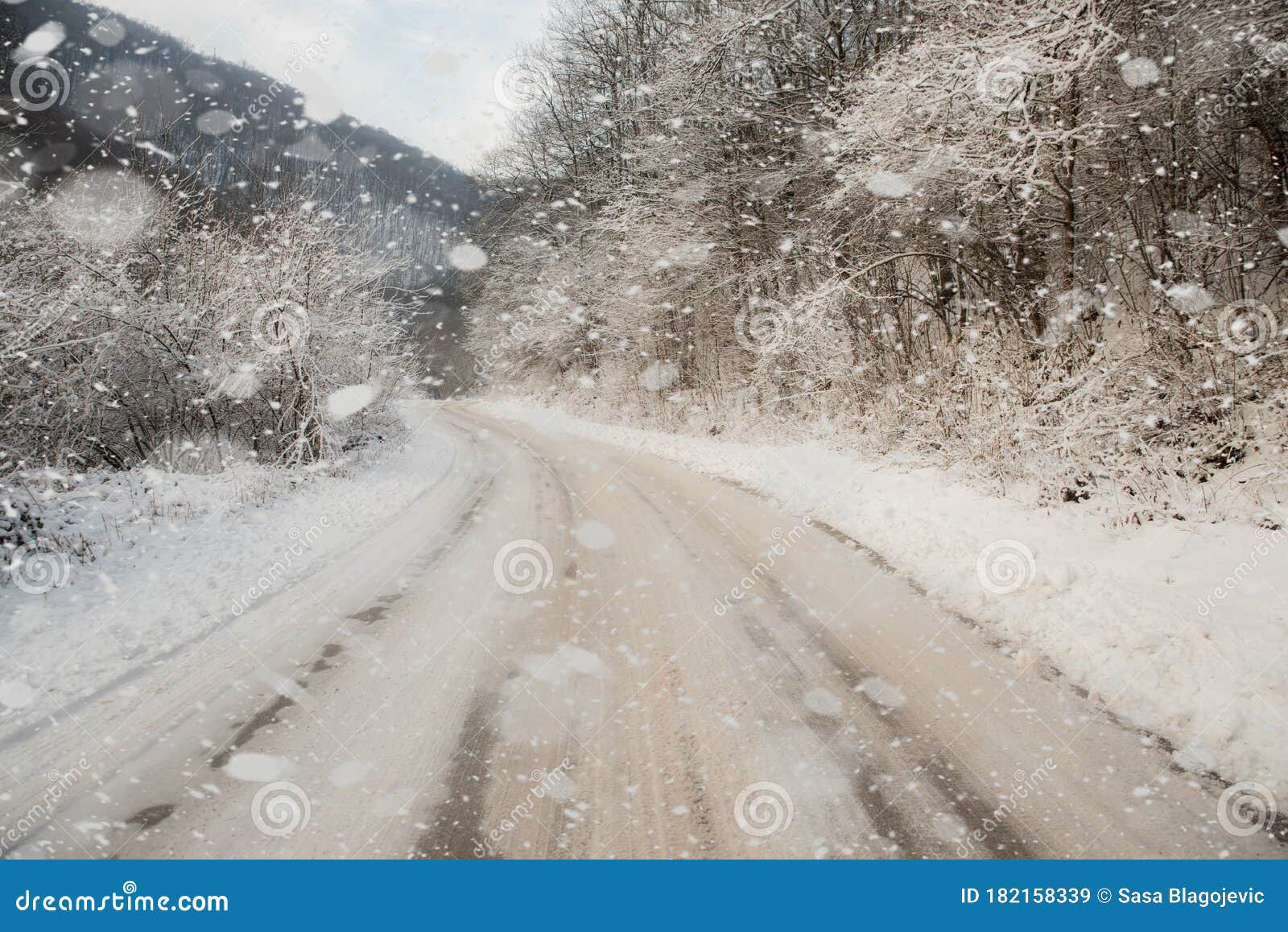 Road with snow stock image. Image of sunlight, snowy - 182158339