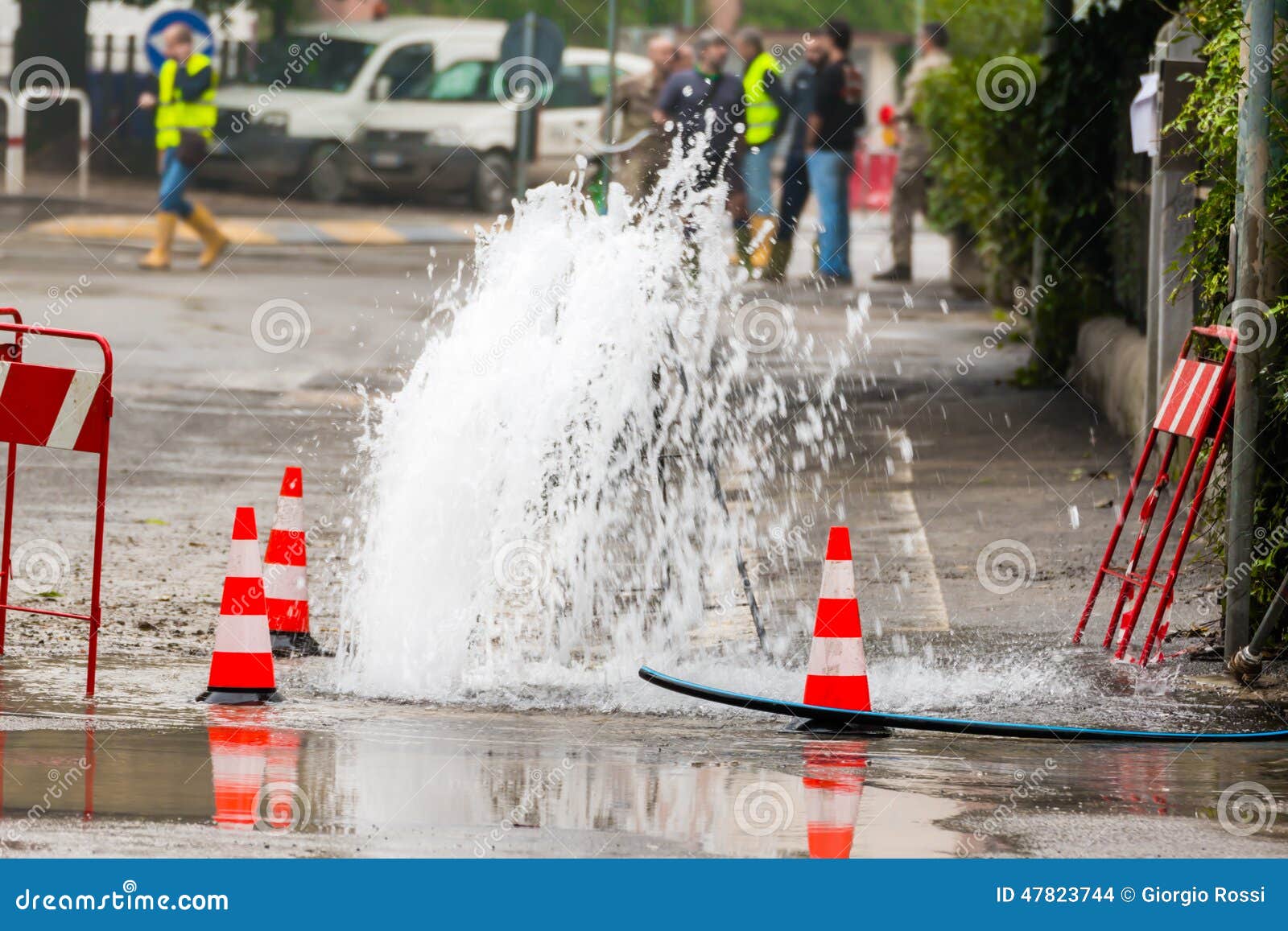 Road Spurt Water beside Traffic Cones Stock Photo - Image of repair ...