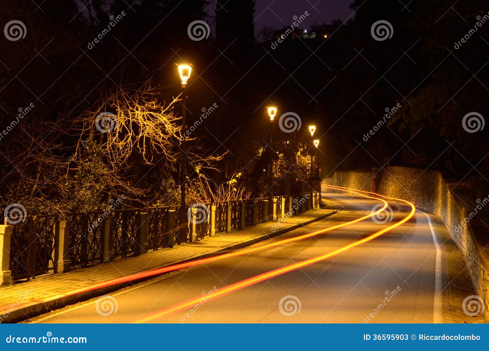 Road with street lamps stock image. Image of floor, evening - 36595903