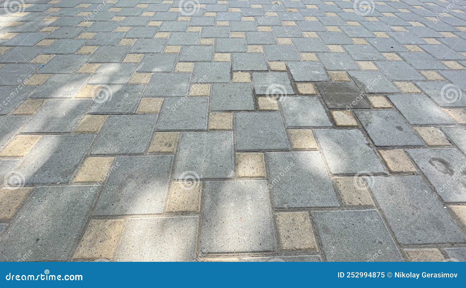 The Road Surface is Made of Natural Stone in the Form of Square Tiles ...