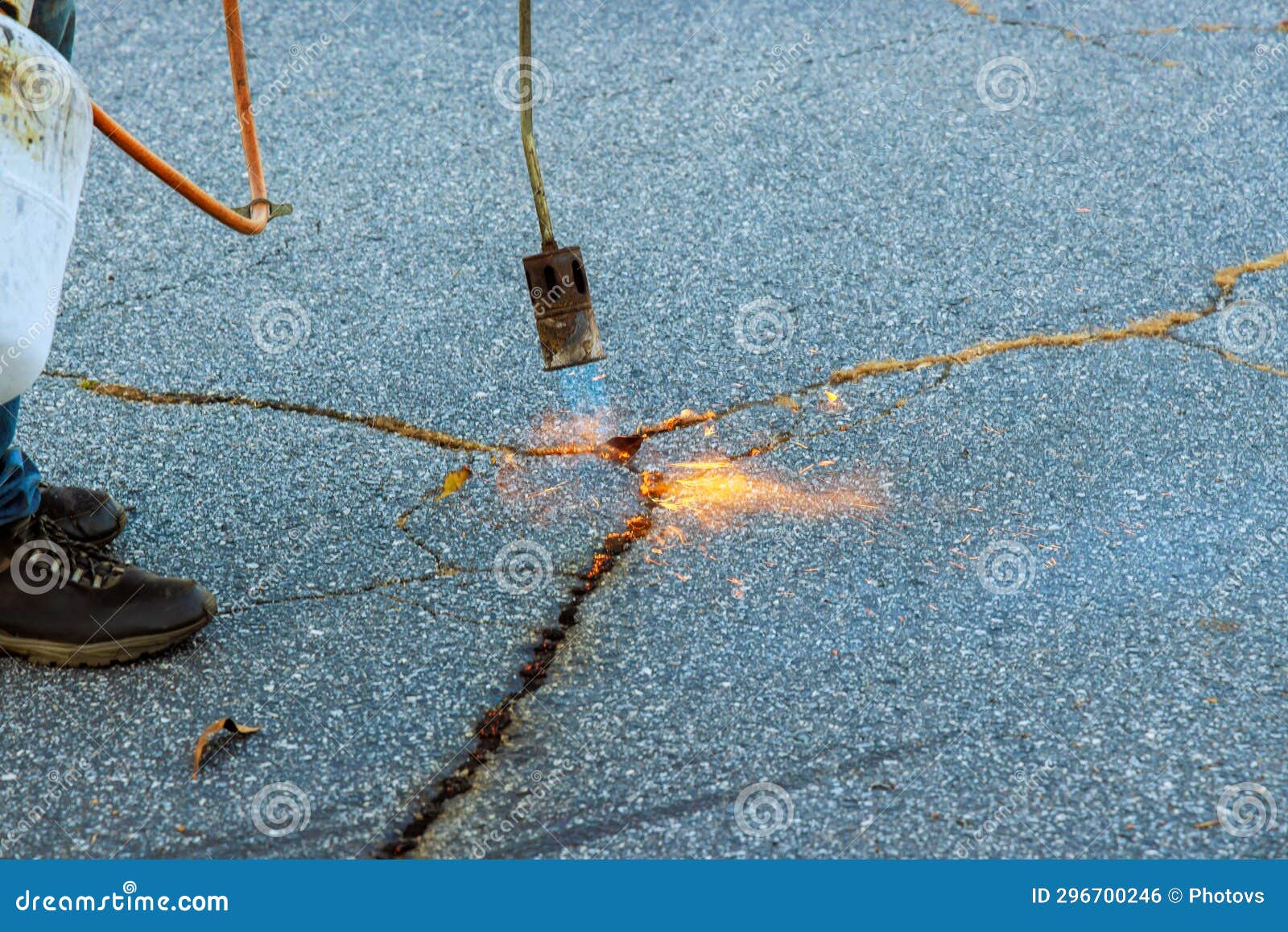 Road Surface Restoration Work in the Worker Performs on Burning Dry ...